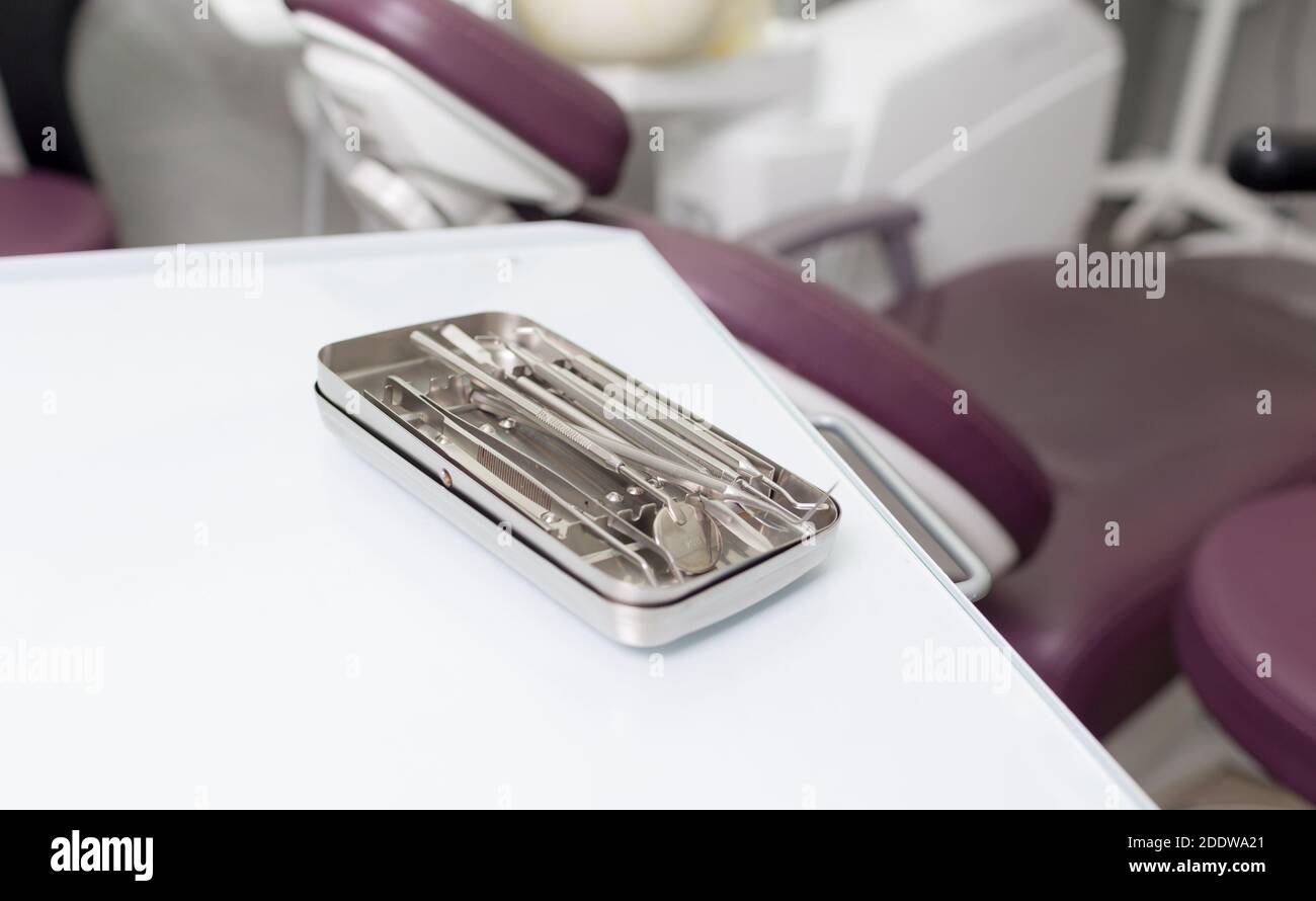 dental devices on a white table close up Stock Photo - Alamy