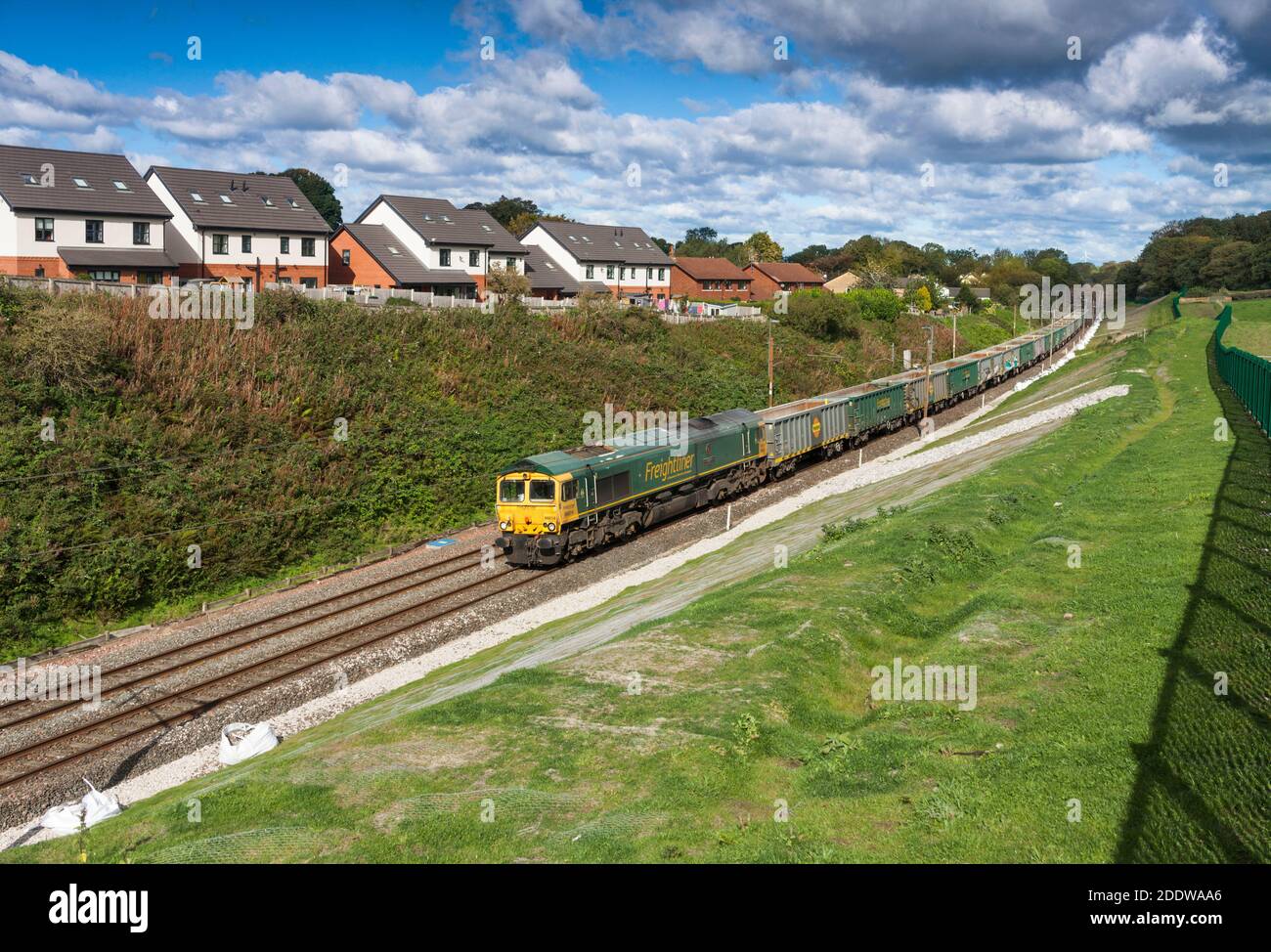 Freightliner class 66 locomotive 66614 hauling a freight train of empty ...