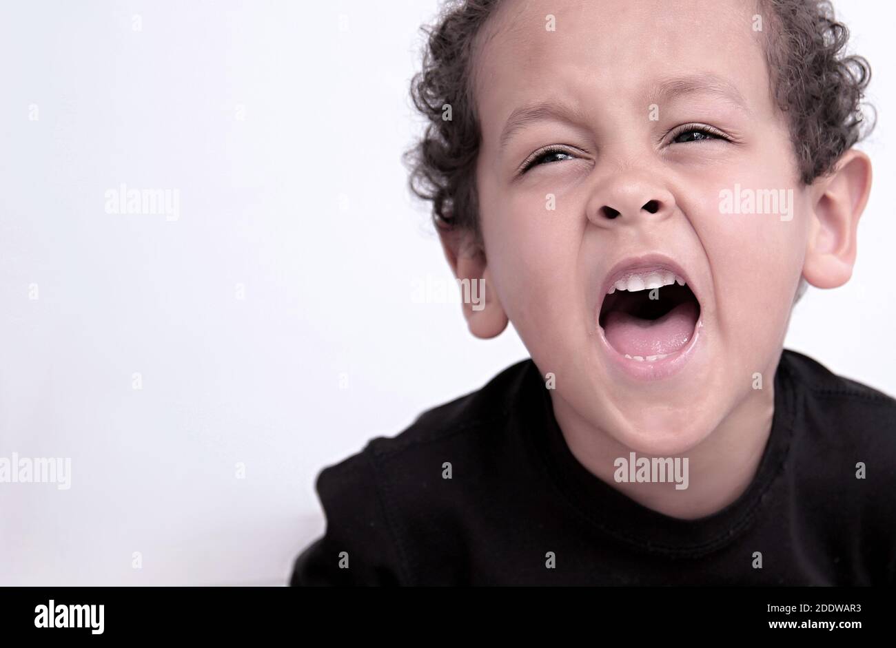 little boy shouting with open mouth on white background stock photo ...
