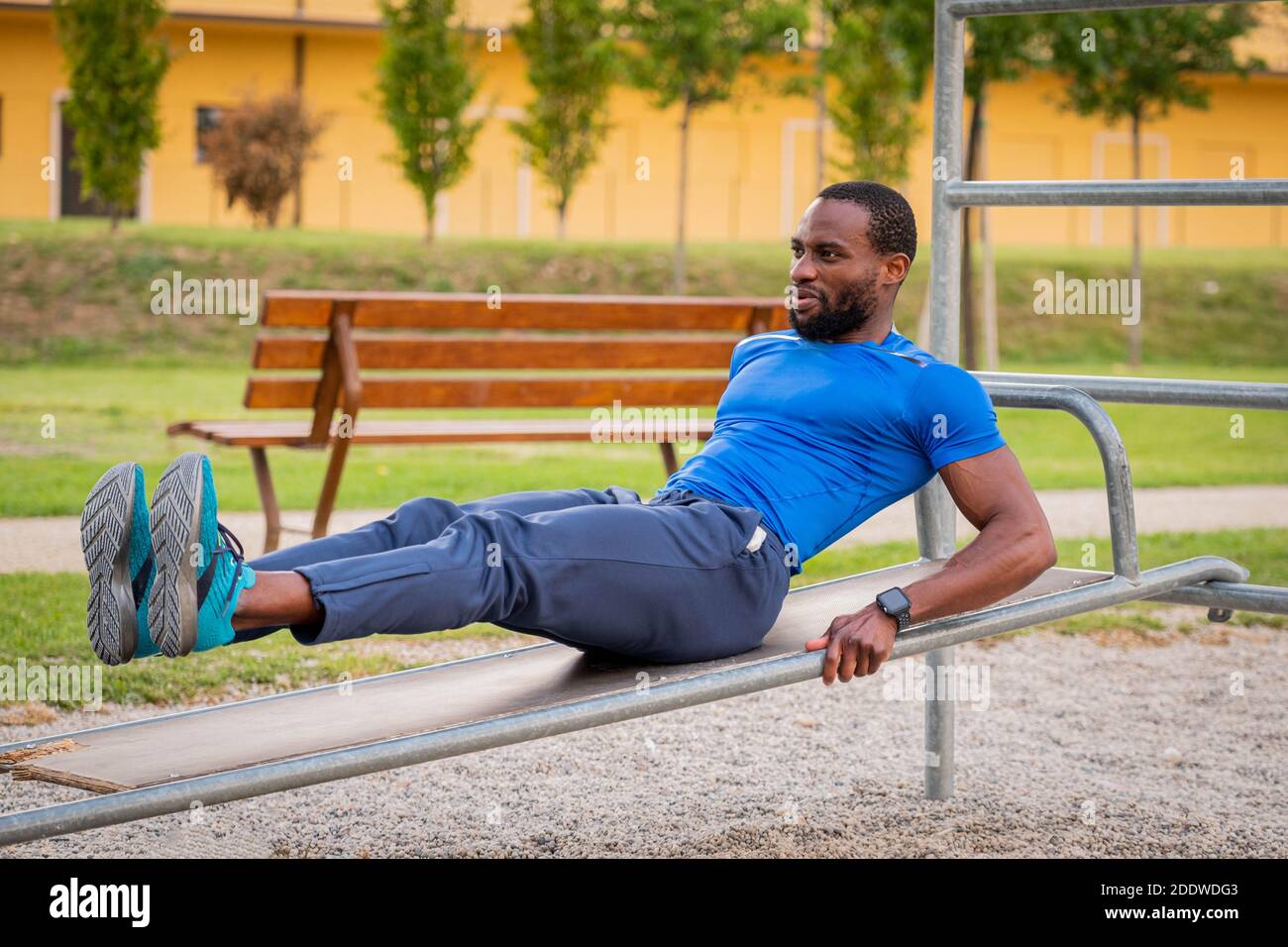 Fitness afro american boy doing situps outdoor - Handsome african man ...