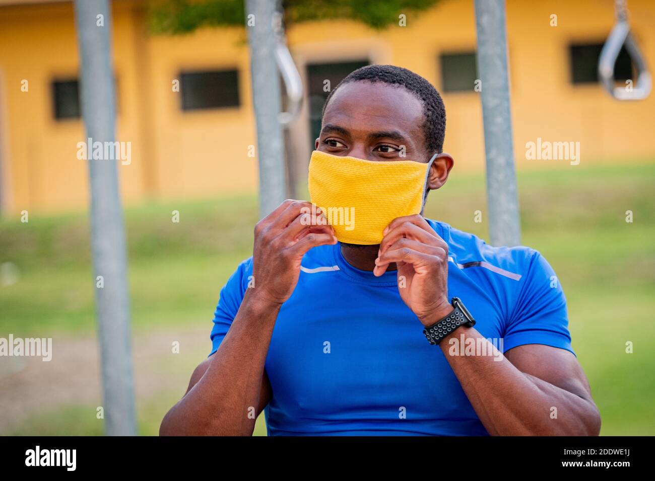 Athlete boy preparing to do workout with protective mask - fitness ...