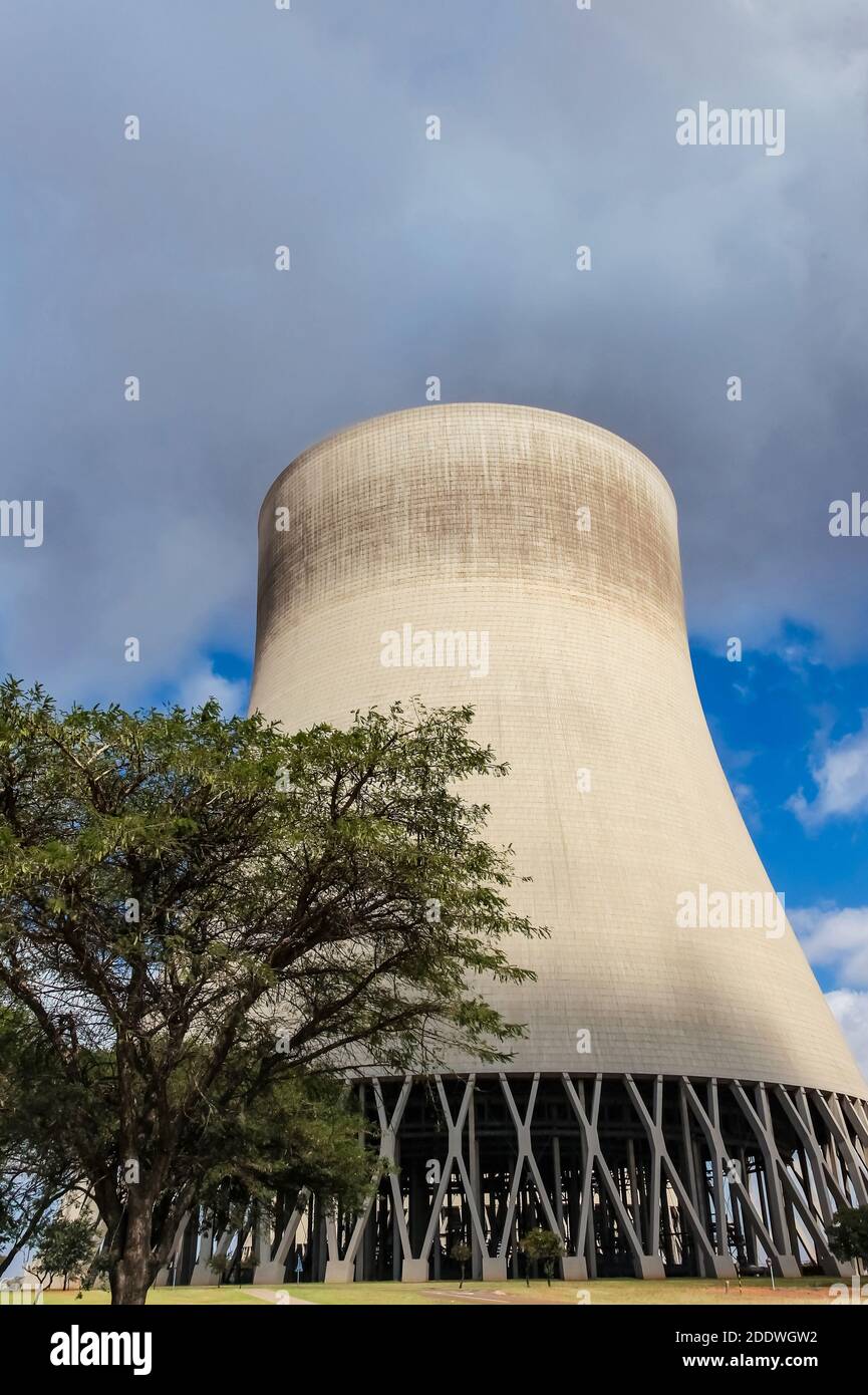 A vertical shot of an electrical generation plant outdoors Stock Photo ...