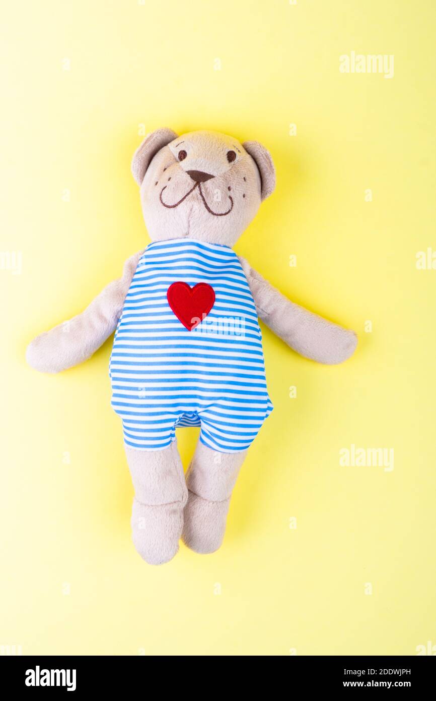 single bear toy with red heart, love concept. Creative greeting card ...