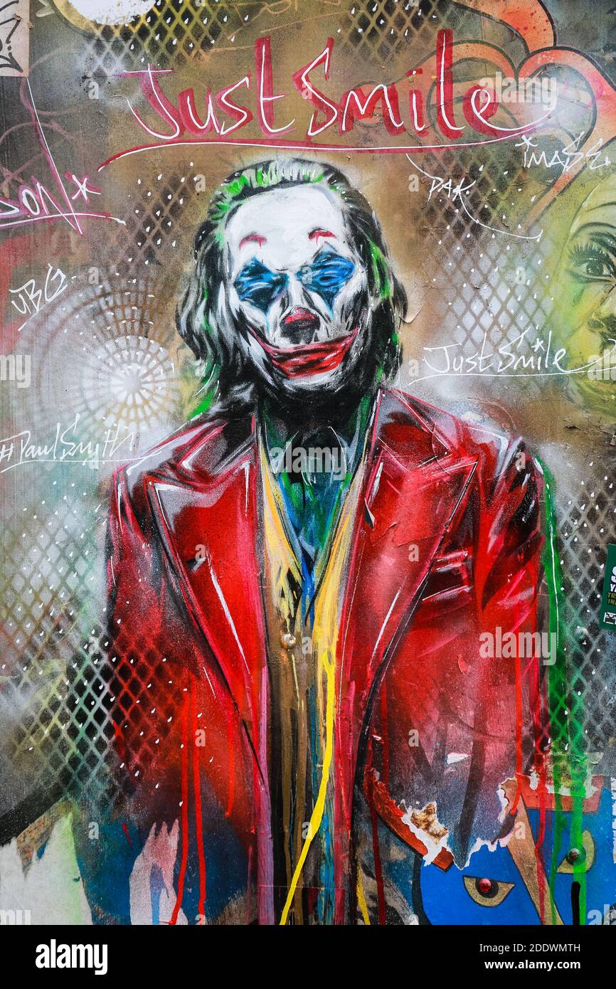 London, UK. 26 November 2020. Mural of the Joker with text saying 'Just ...