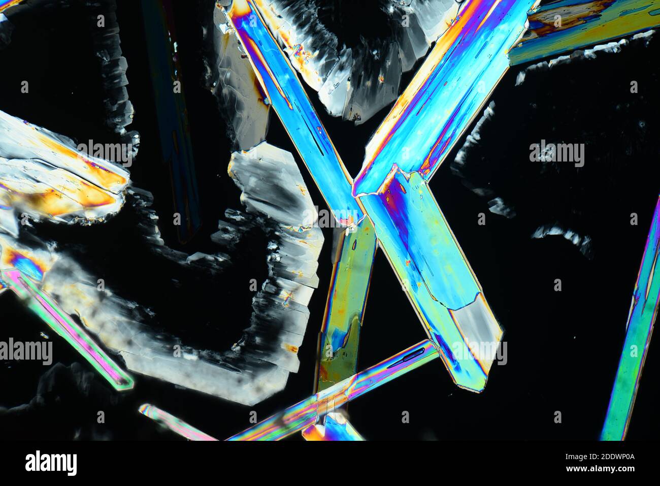Crystals of boracic acid under microscope with polarized light from ...