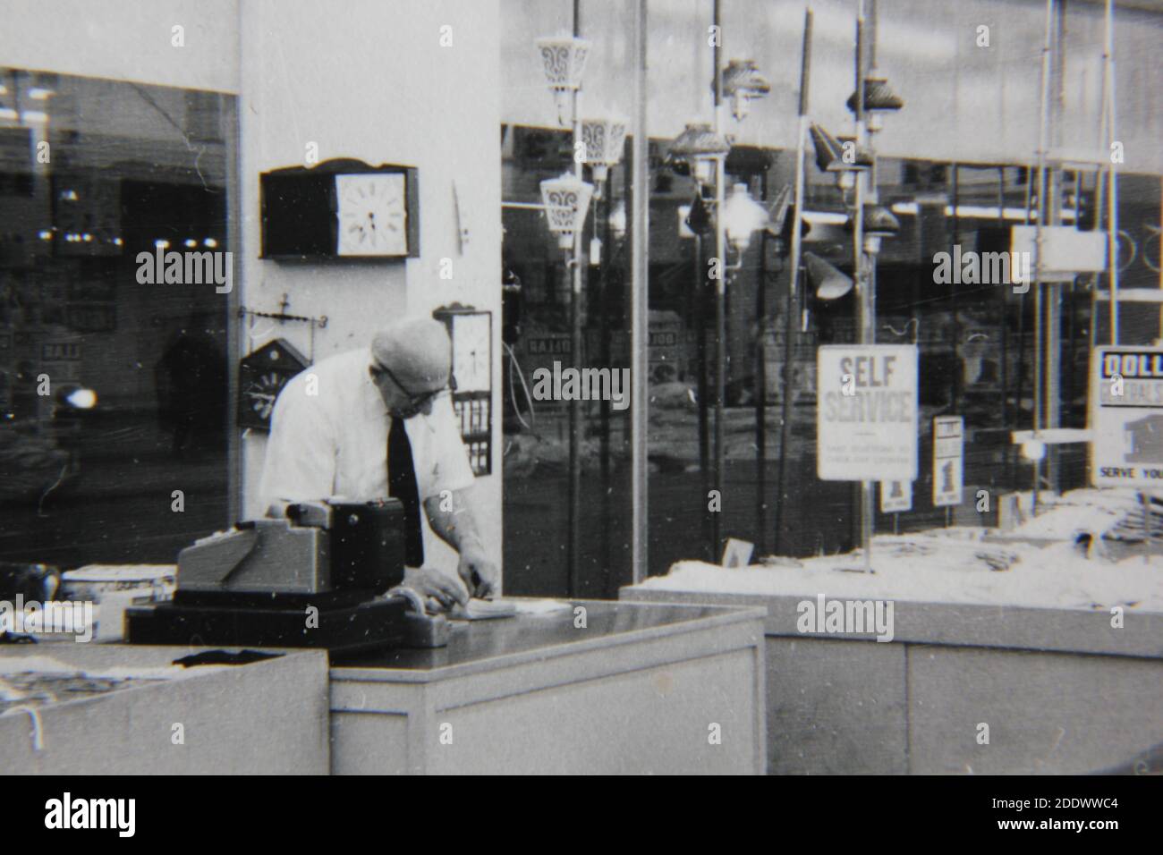 Fine 1970s vintage black and white photography of a regular guy hard at ...