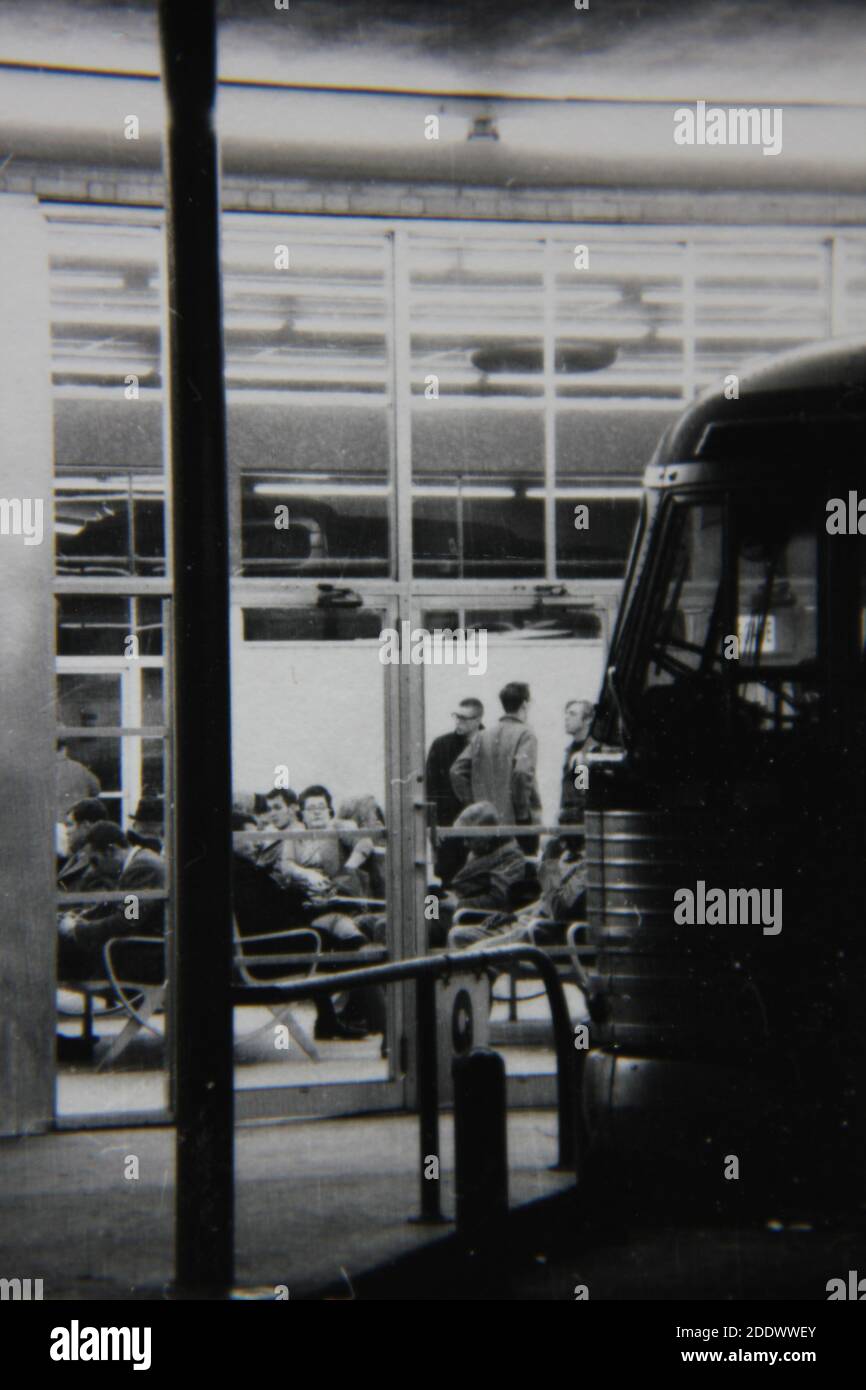 Fine 1970s vintage black and white photography of people waiting in the ...