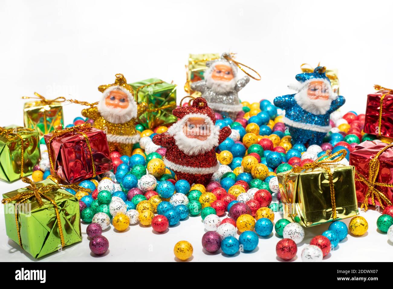 Santa Claus with colorful balls and Gift boxes on white backgrounds ...