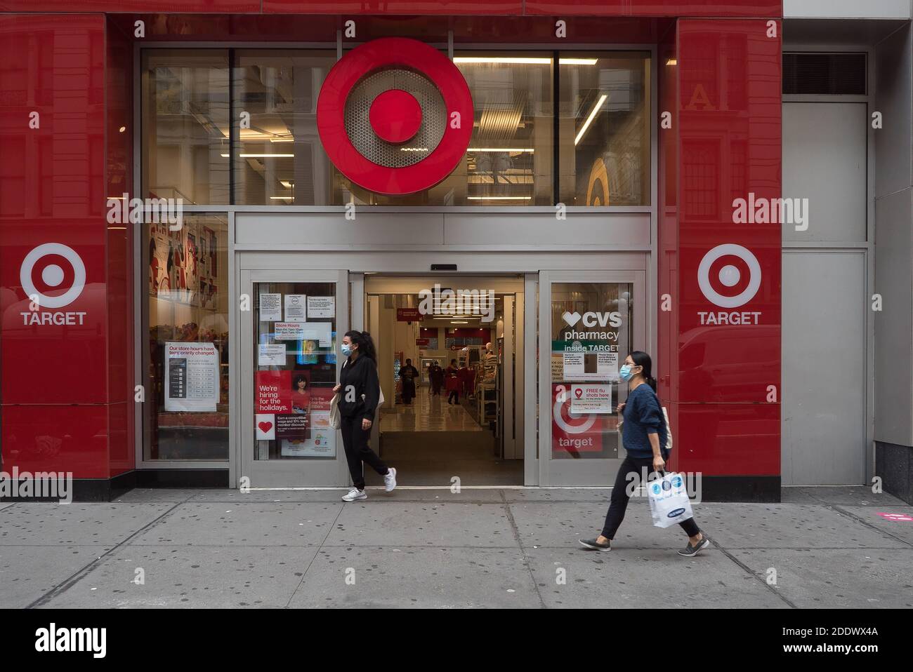 People walking in front of a Target store on 34th street Stock Photo ...