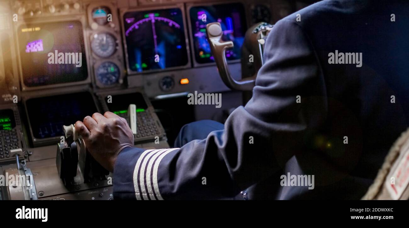 A closeup shot of a pilot flying a plane Stock Photo - Alamy