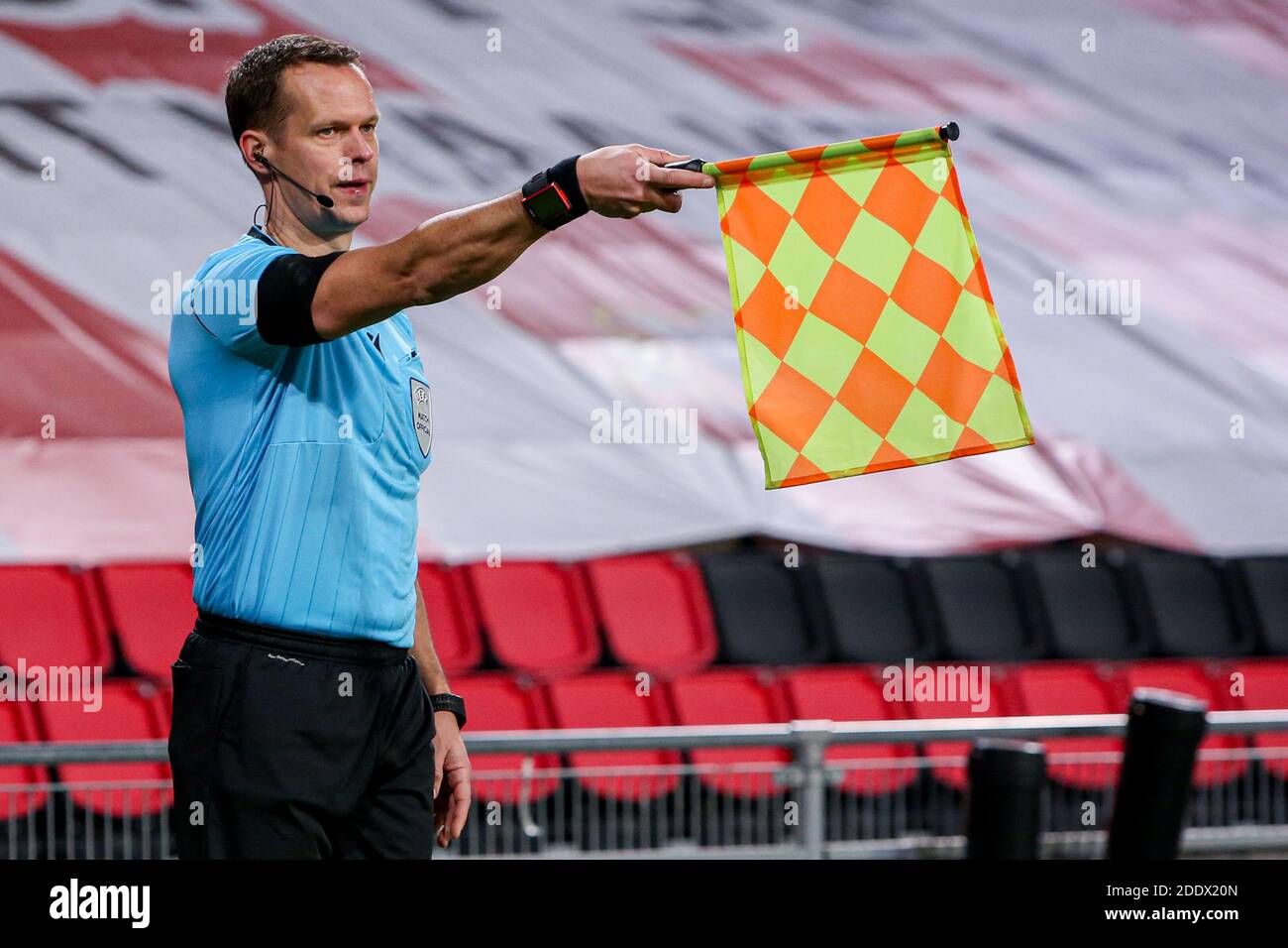 EINDHOVEN, NETHERLANDS - NOVEMBER 26: Assistant referee Haralds ...