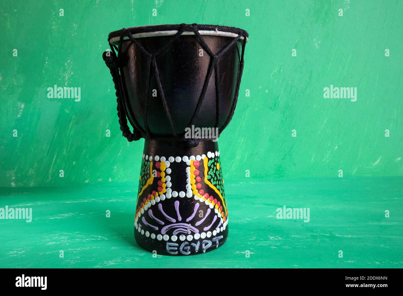 African drum ,djembe drum on green background Stock Photo - Alamy
