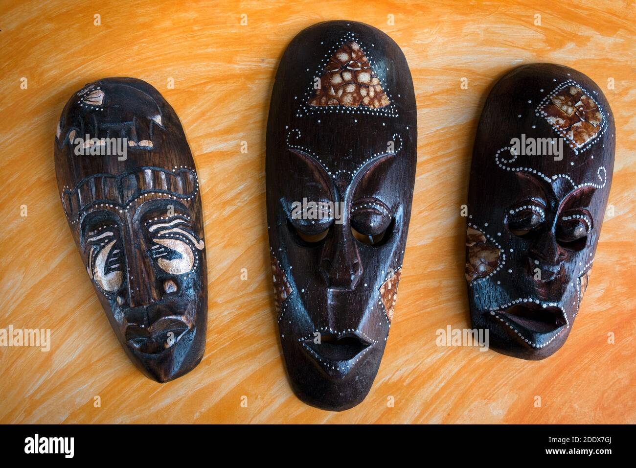 Traditiona decorated handmade african masks carved from the wood of ...