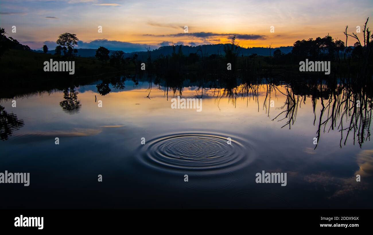 sunset and Water reflection Stock Photo - Alamy