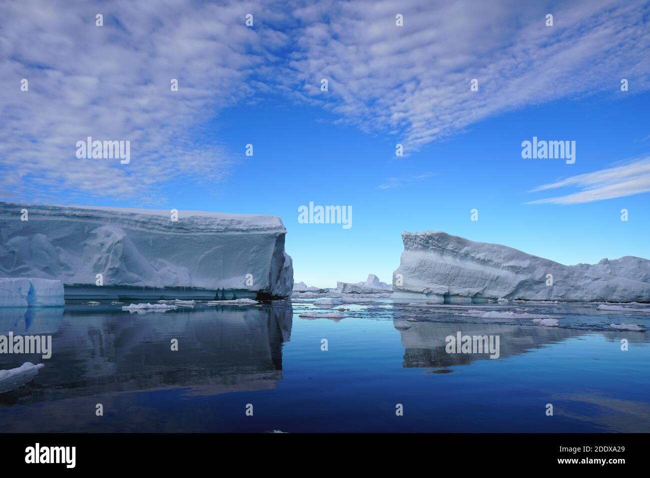 The bay is surrounded by icebergs, leaving only a gap. Make the bay ...