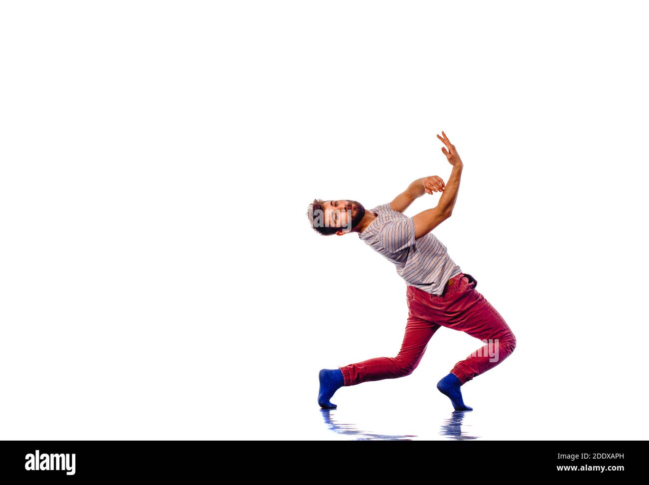 Disco dancer showing some movements against isolated white background ...