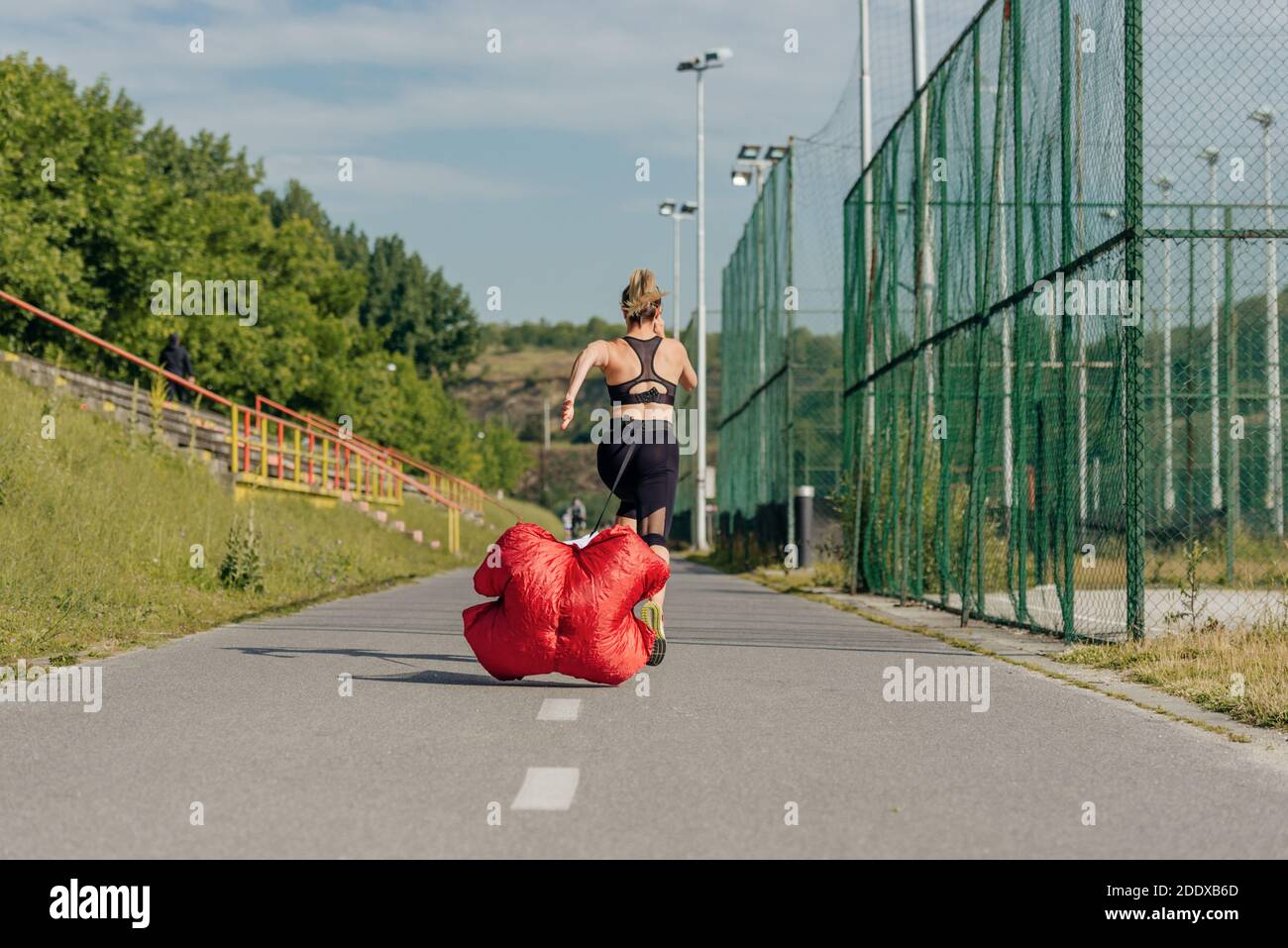 Rear view athletic female sprinter hi-res stock photography and images ...