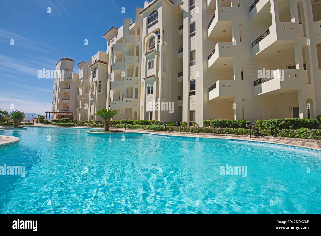 Large swimming pool with garden at a luxury tropical hotel resort Stock ...