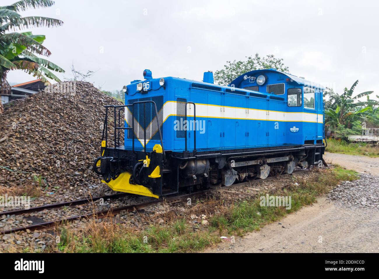 Blue train at a train yard in Tenom, Sabah, Malaysia Stock Photo - Alamy