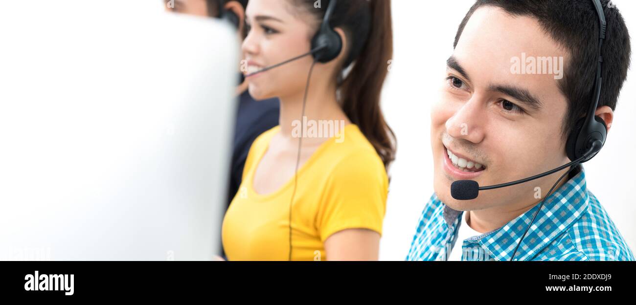 Smiling casual call center team - panoramic banner Stock Photo - Alamy