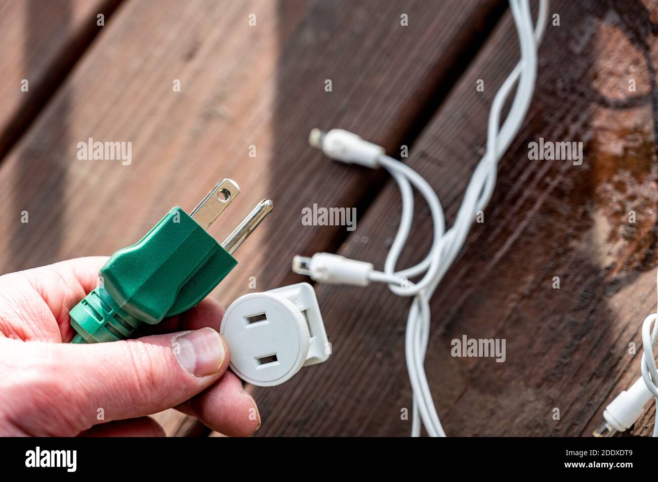 Typical use of a 3-prong electrical power adapter to go from a grounded ...