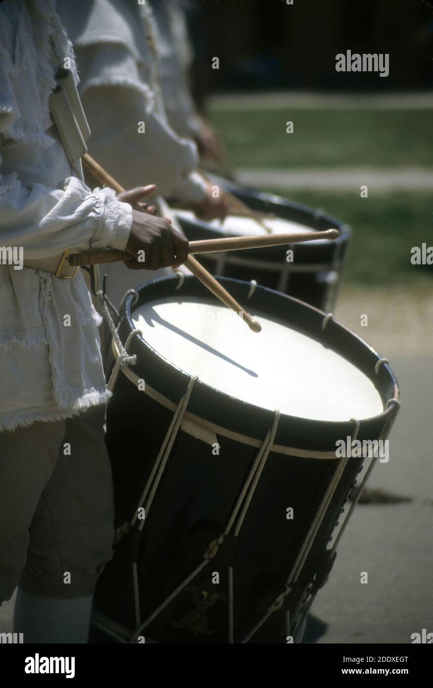 Drummers in white colonial uniforms march in a Memorial Day Parade in ...