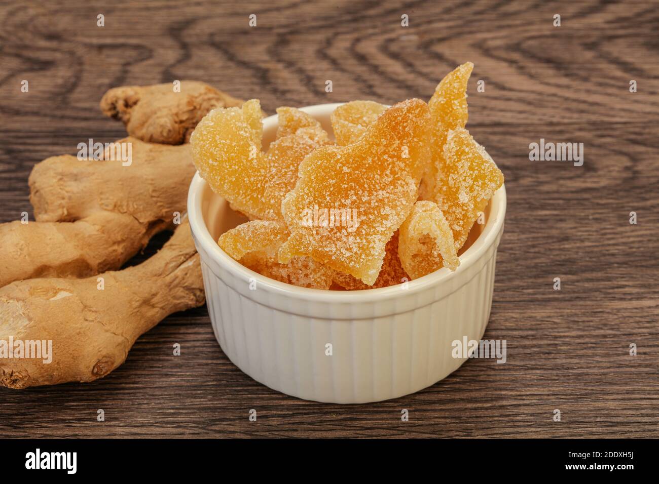 Dry sweet ginger snack in the bowl Stock Photo - Alamy