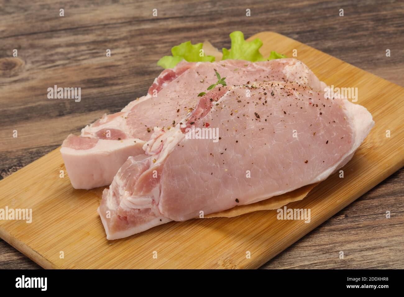 Raw pork meat steak ready for grill Stock Photo - Alamy