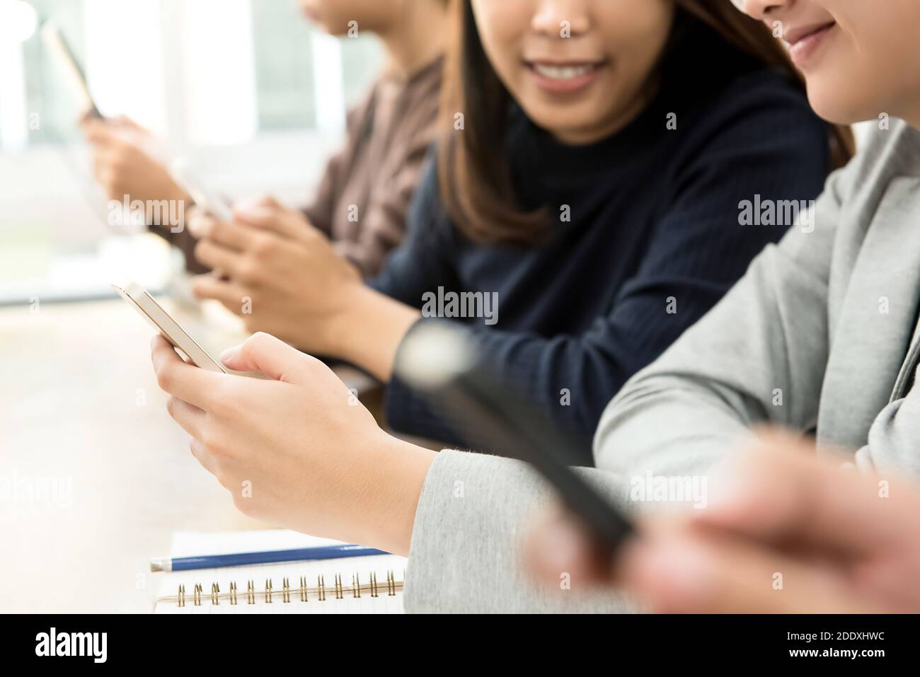 Young millennial people using social media on smartphone - people and ...