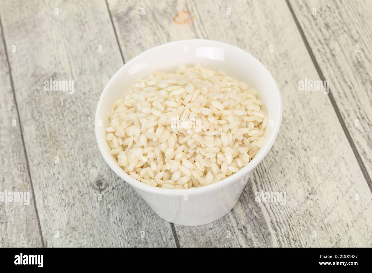 Raw Arborio rice for Italian risotto Stock Photo - Alamy