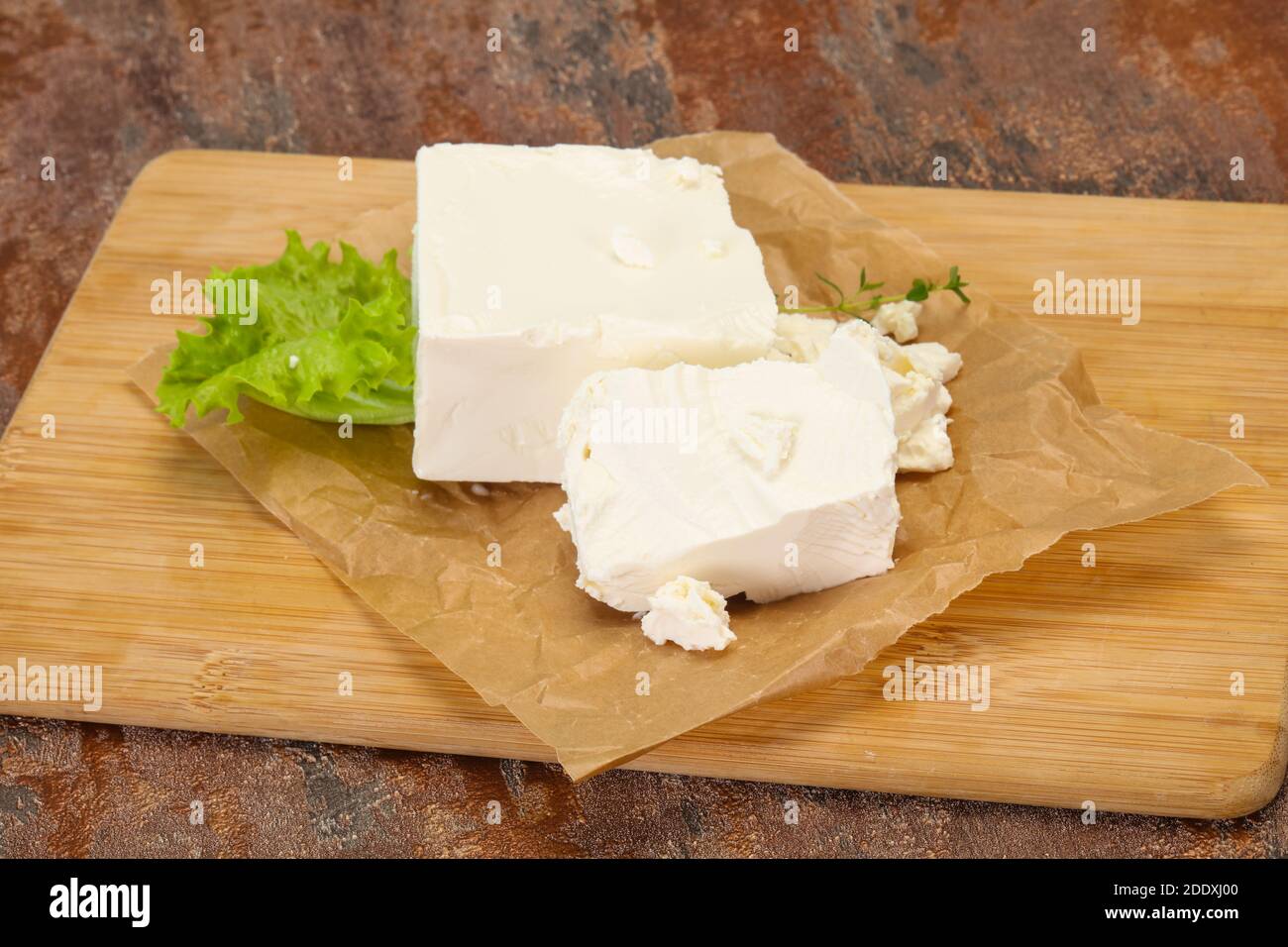 Greek traditional Feta soft cheese in the plate Stock Photo - Alamy