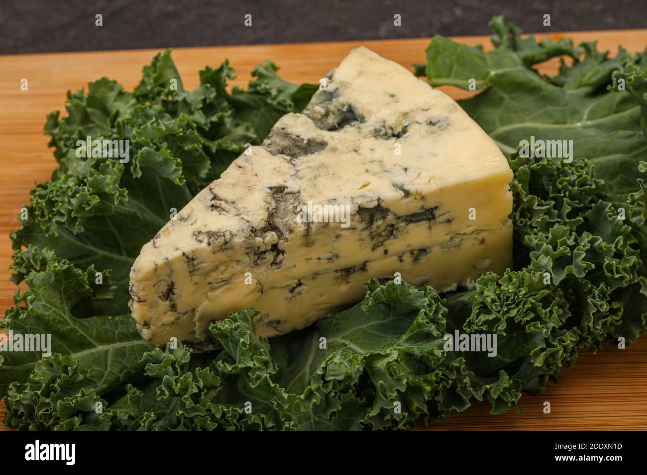Dairy Blue cheese triangle with mold Stock Photo - Alamy