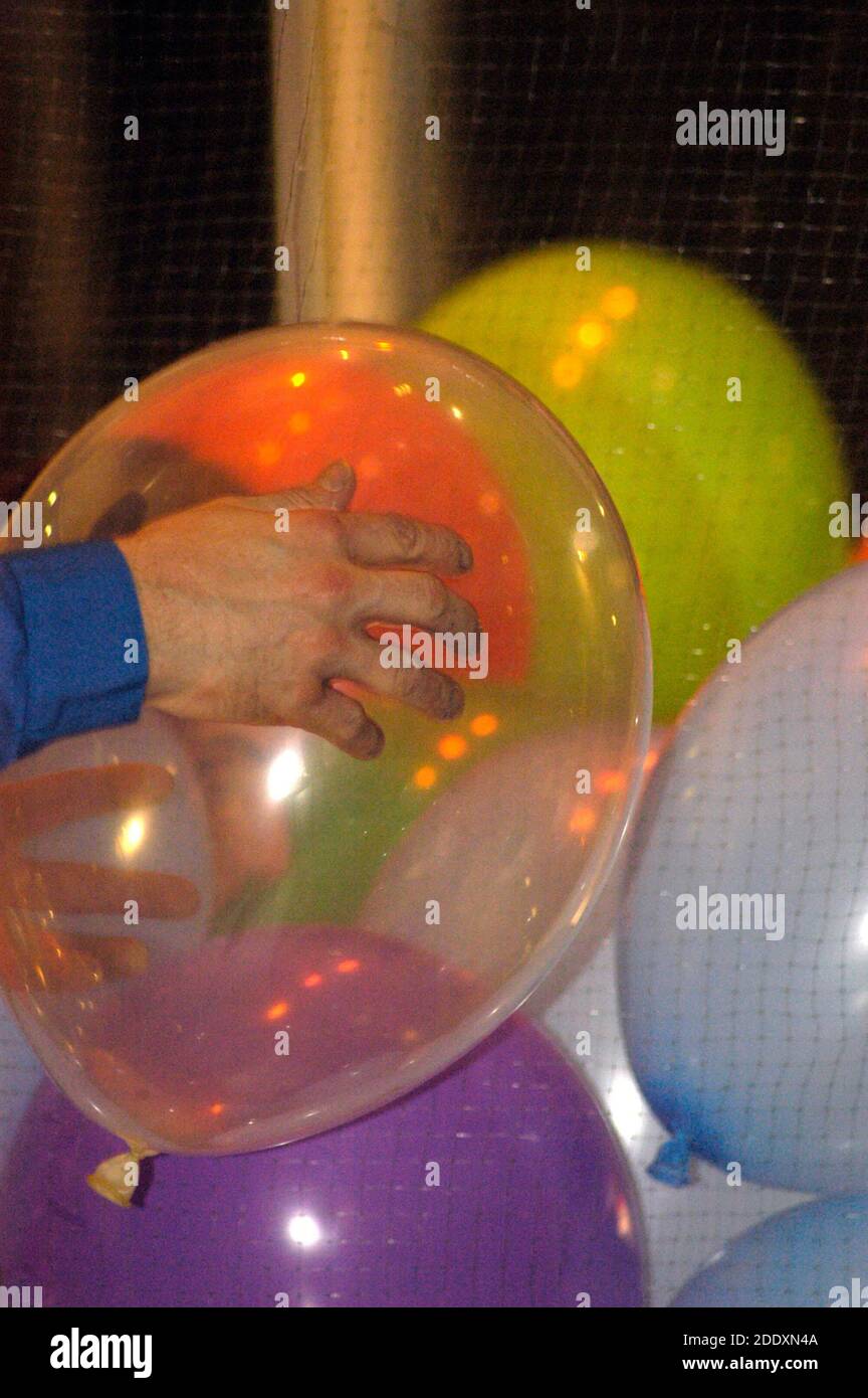 a hand touching a balloon, human tactile and haptic perception Stock ...