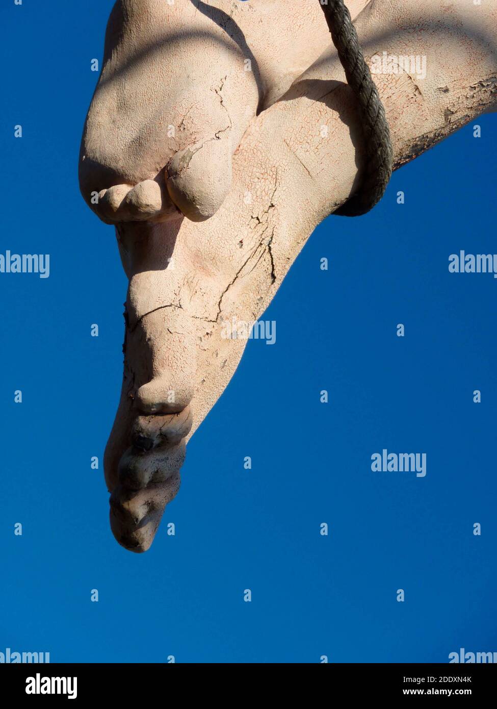 stone feet of a statue, barefoot, clear blue sky background Stock Photo ...