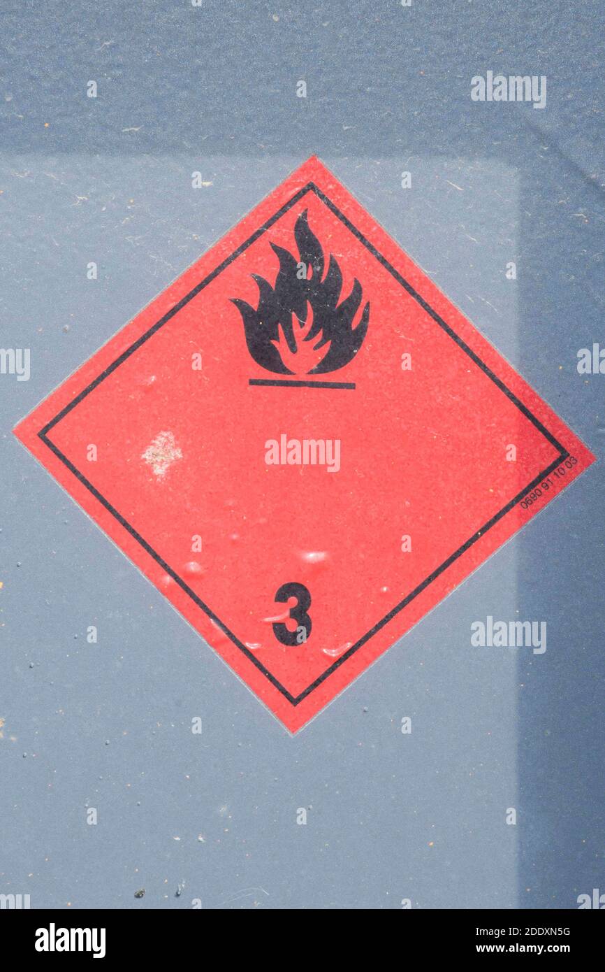 red danger sign for ignitable liquid, flame symbol and the number three ...