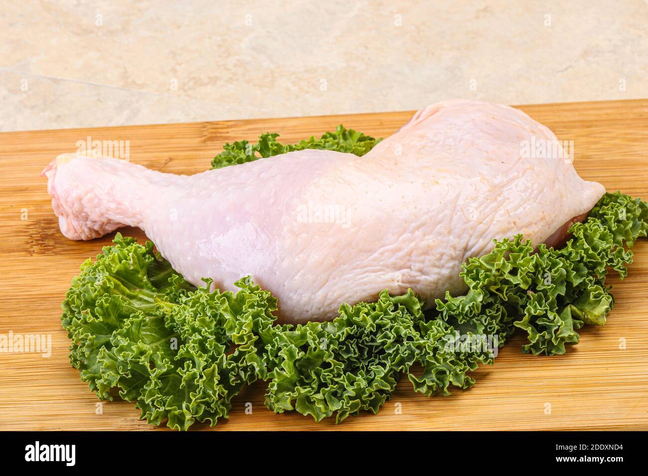 Raw uncooked chicken leg for cooking Stock Photo - Alamy