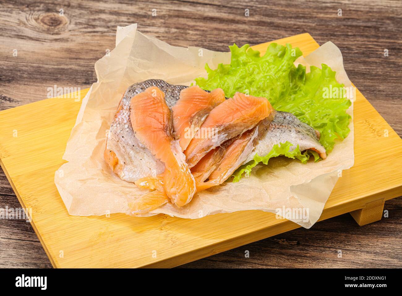 Sliced natural wild trout fillet over board Stock Photo - Alamy