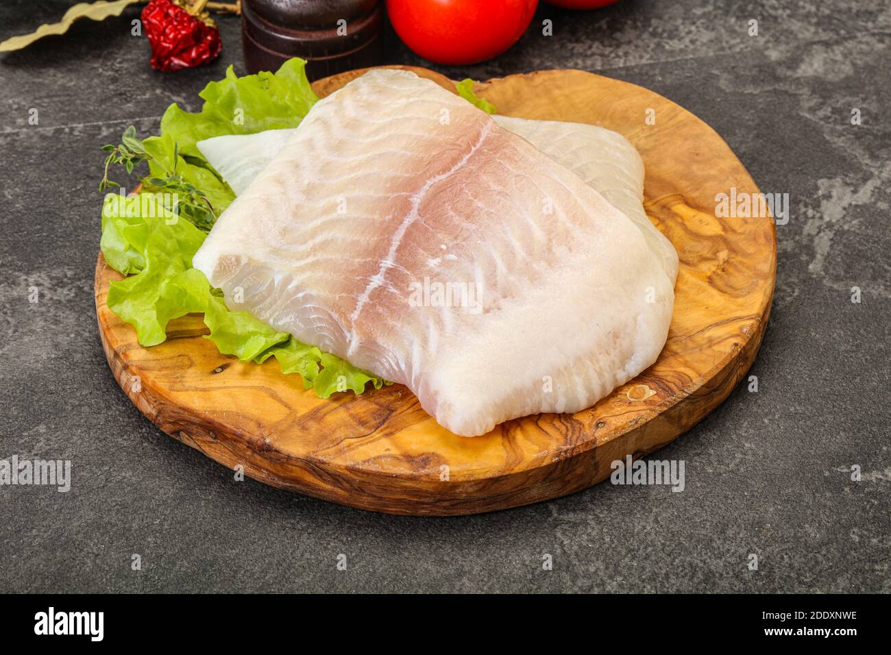 Raw pangasius fillet fish for cooking Stock Photo - Alamy