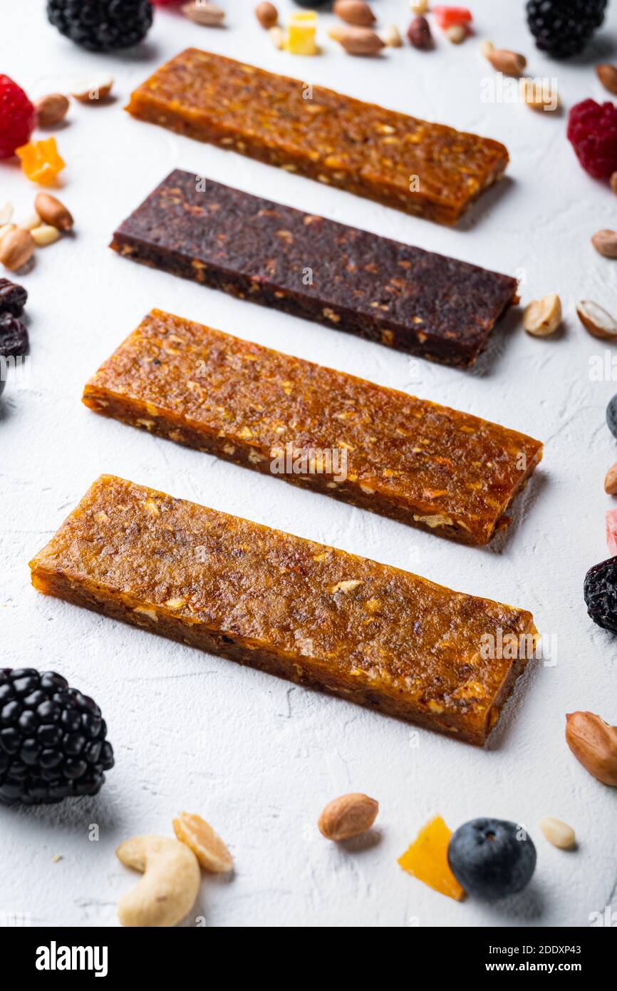 Fruit berry nut energy bars, healthy snack, on white background Stock ...