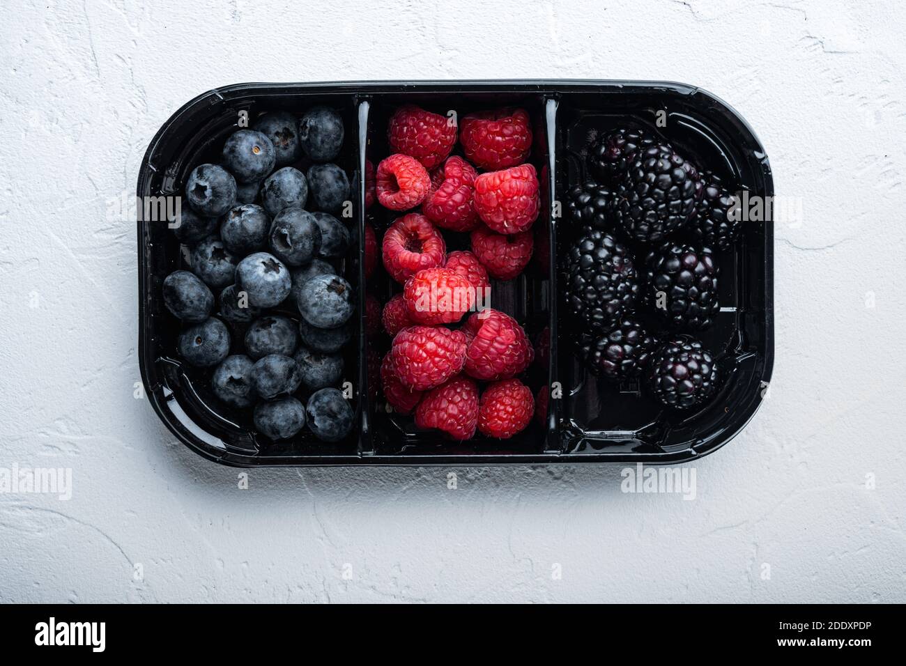 Berry platter, harvest of berries, blueberries, raspberry with ...