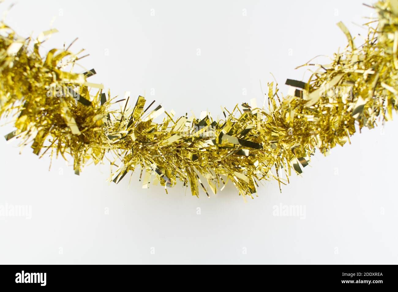 a golden garland for christmas on holiday background Stock Photo - Alamy