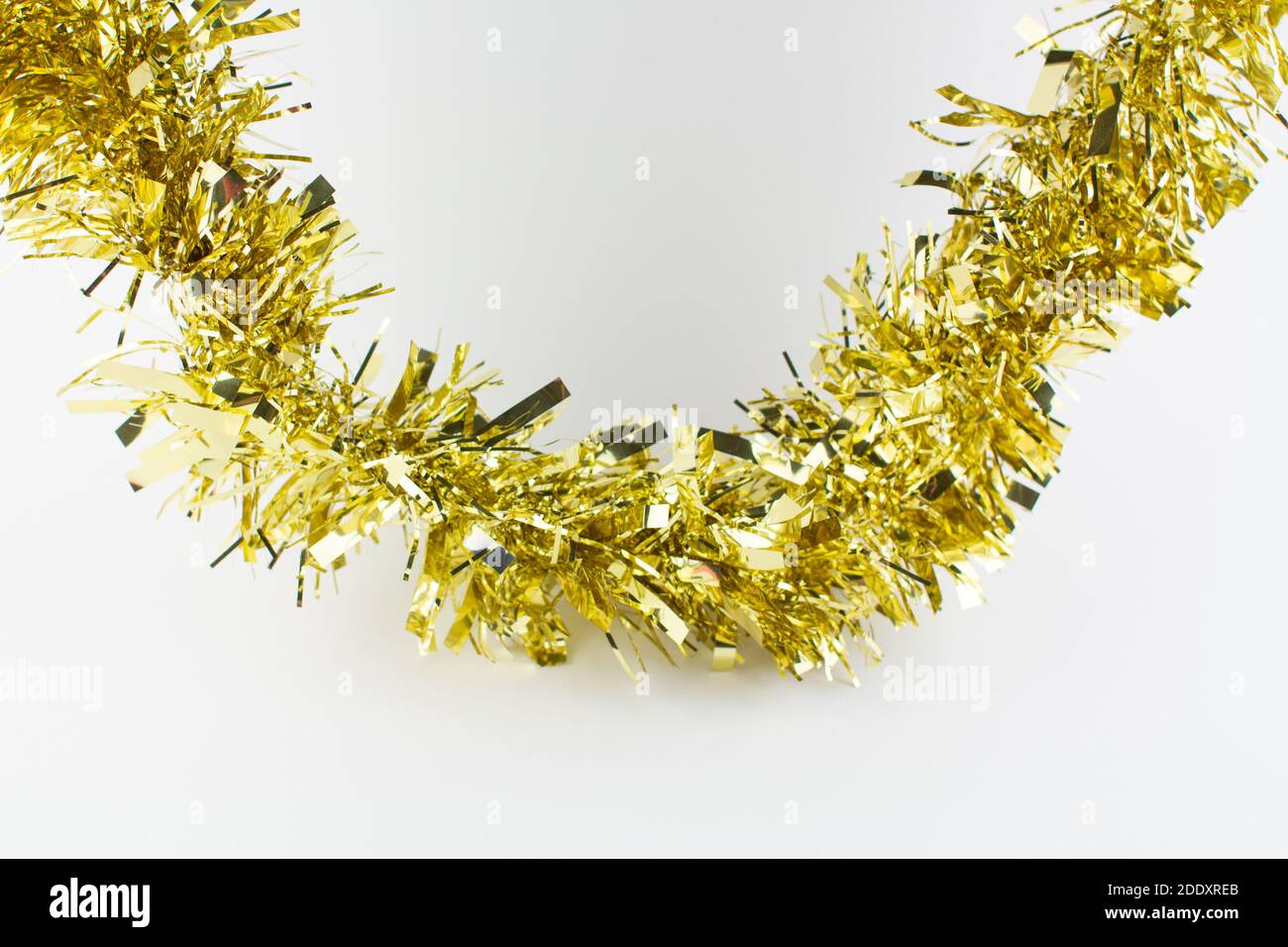 a golden garland for christmas on holiday background Stock Photo - Alamy