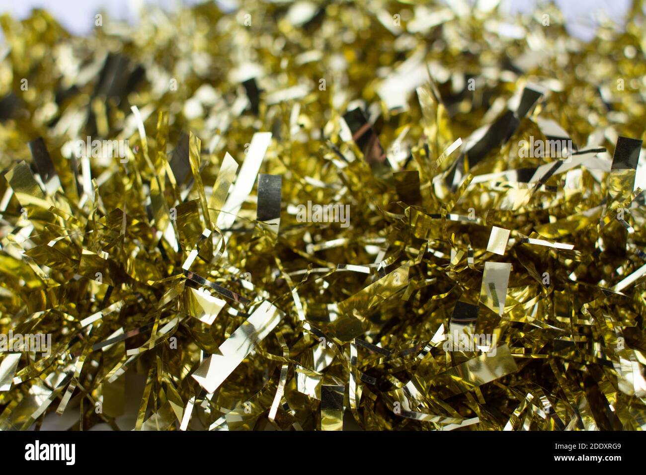a golden garland for christmas on holiday background Stock Photo - Alamy
