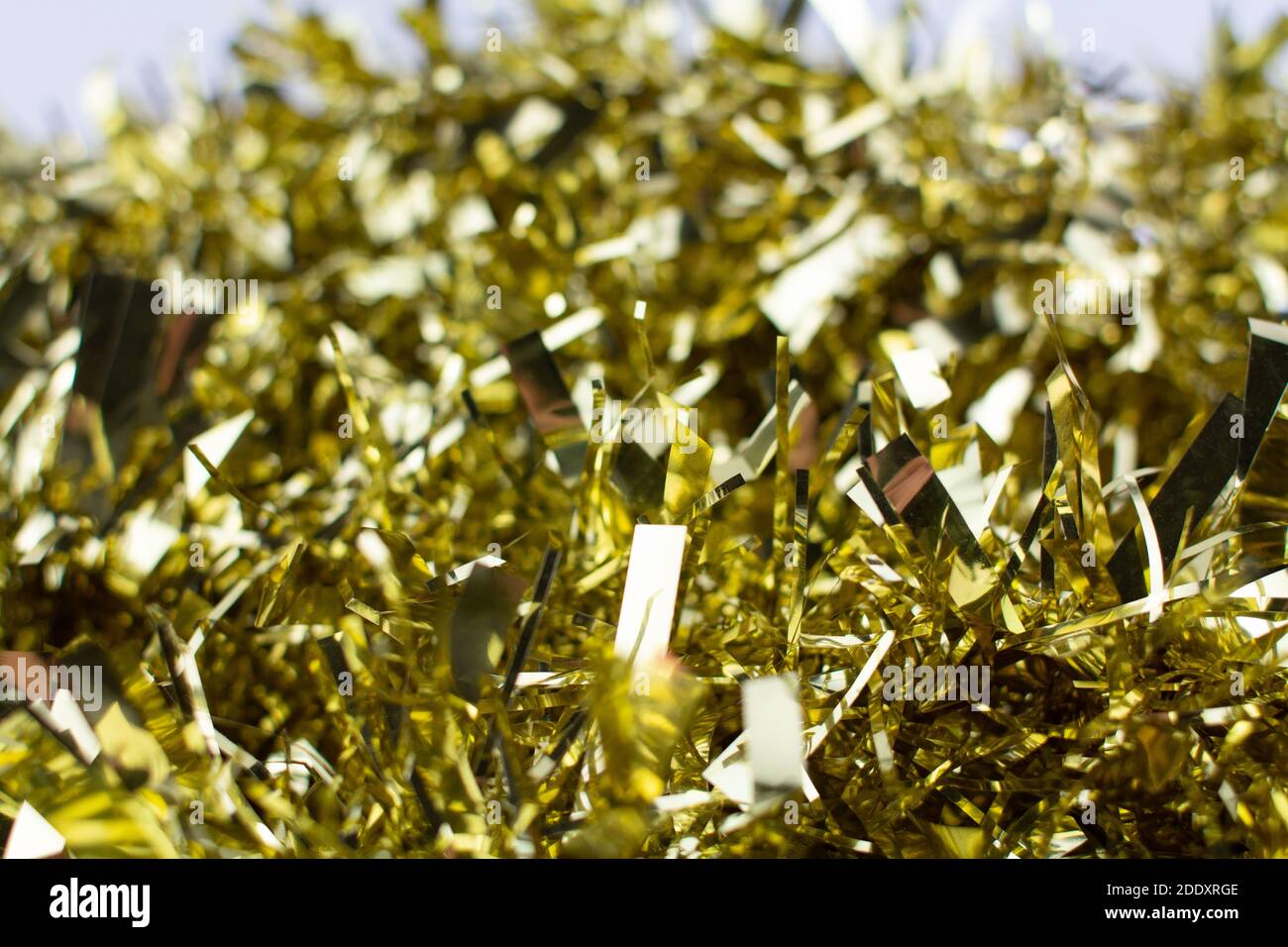 a golden garland for christmas on holiday background Stock Photo - Alamy