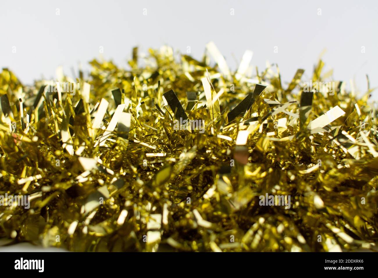 a golden garland for christmas on holiday background Stock Photo - Alamy