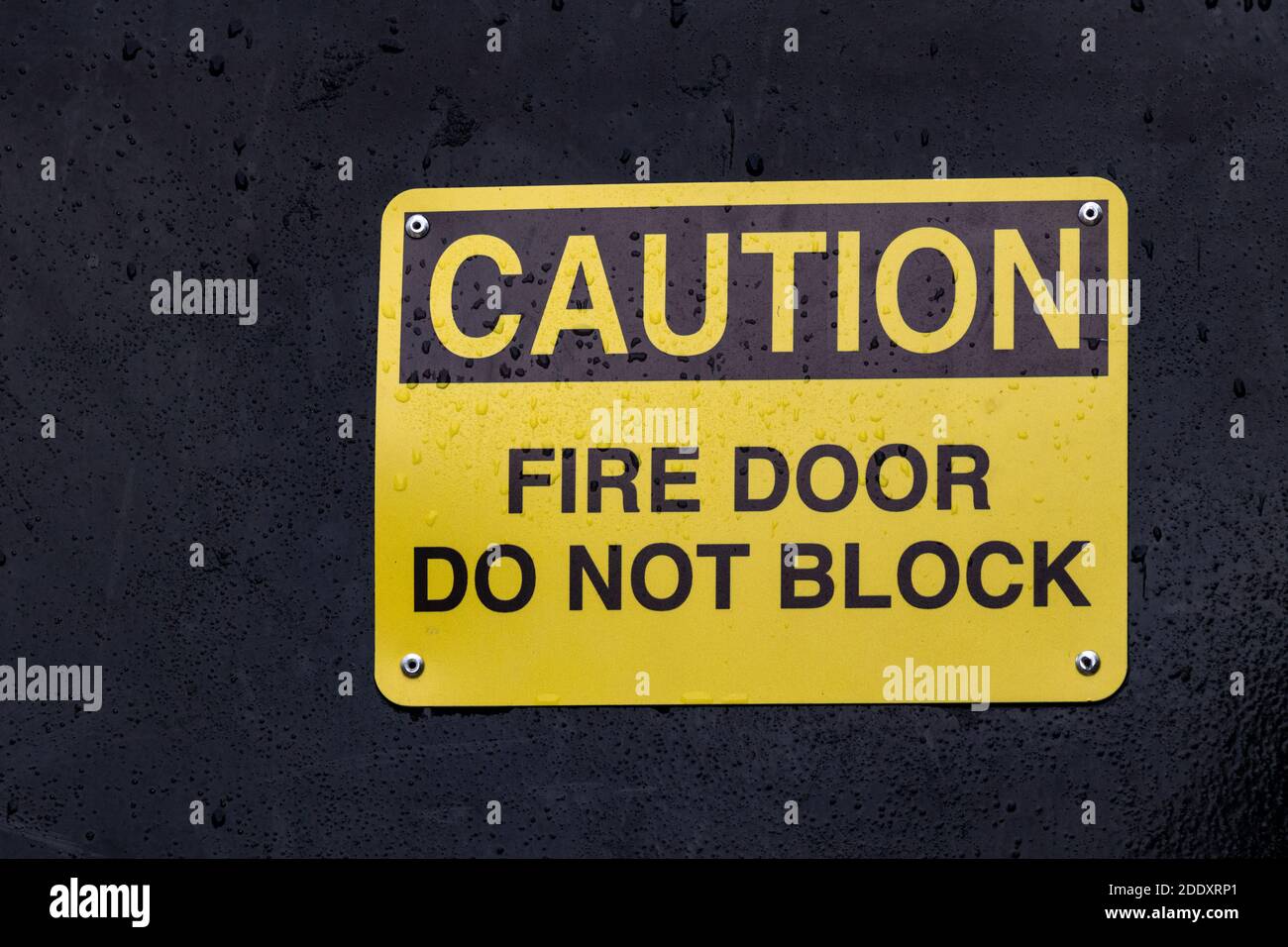 Safety first yellow sign hi-res stock photography and images - Alamy