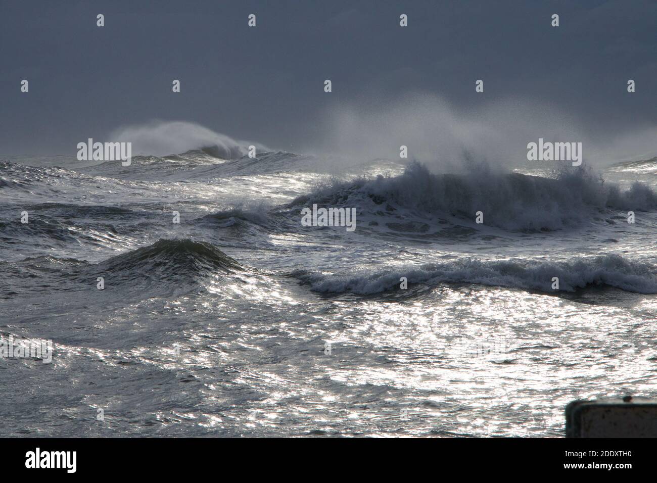 Rough silvery sea in a storm Stock Photo - Alamy