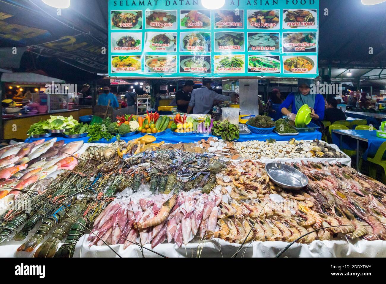 Different seafood at a night food market in Kota Kinabalu, Sabah ...