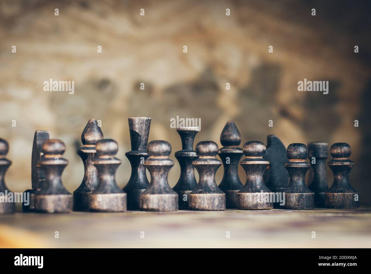 chess casts a shadow on the wall, black pieces made of wood Stock Photo ...