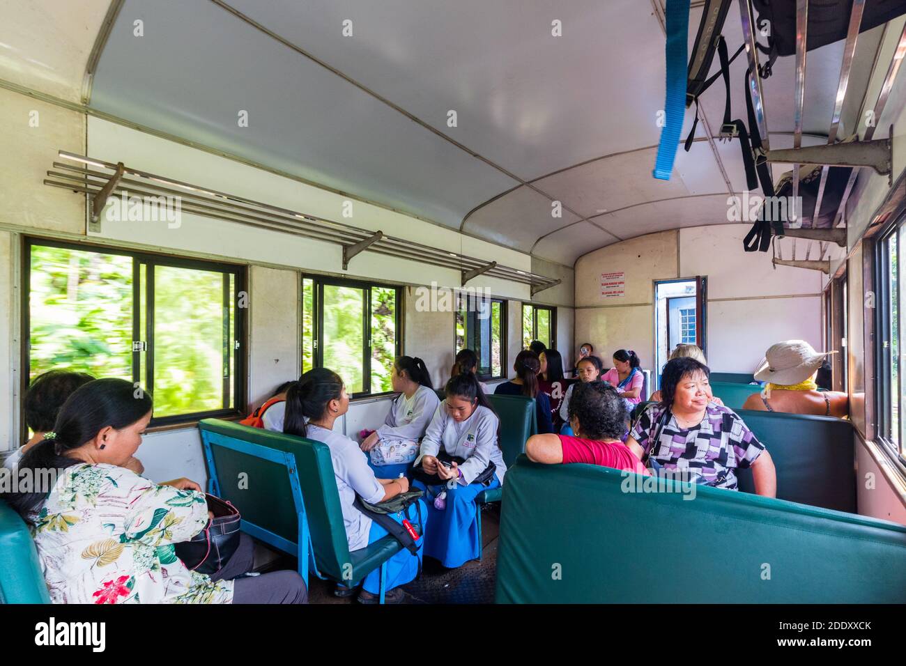 Passengers inside the train bound for TenomThe train station in Tenom ...